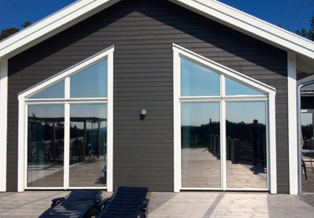 Exterior view of Solar Gard Silver 35 window film installed on a home